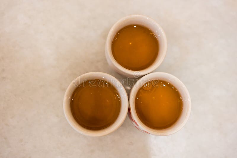 Three cups of hot tea. stock image. Image of aromatic - 349450529