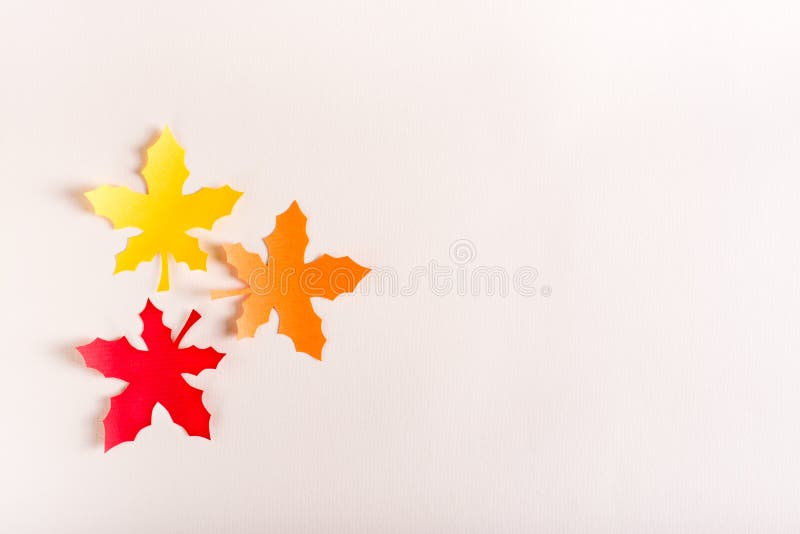 Three Cut Out Multi-colored Maple Leaves from Craft Paper. Autumn ...