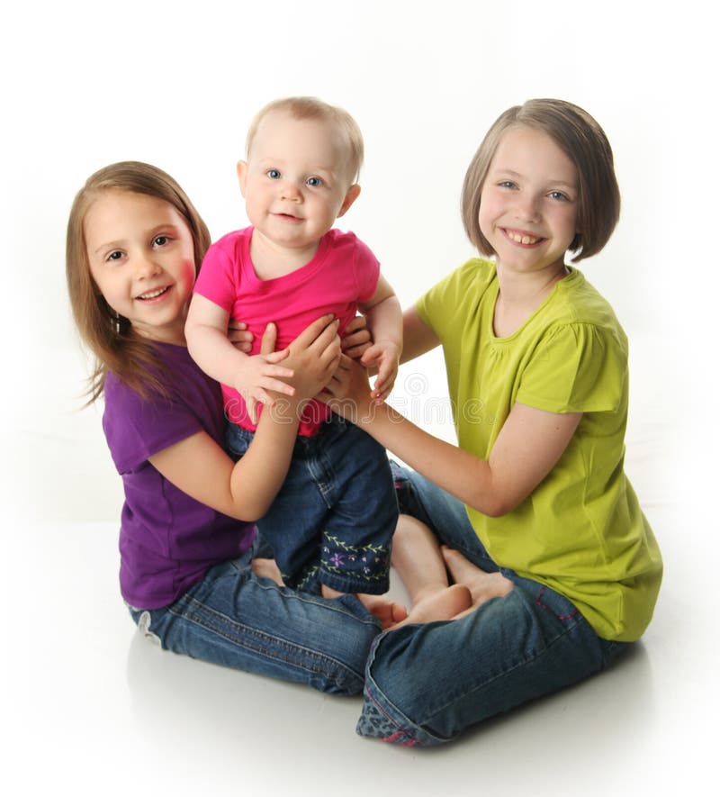 Three cute sisters stock image. Image of casual, joyful - 20119377