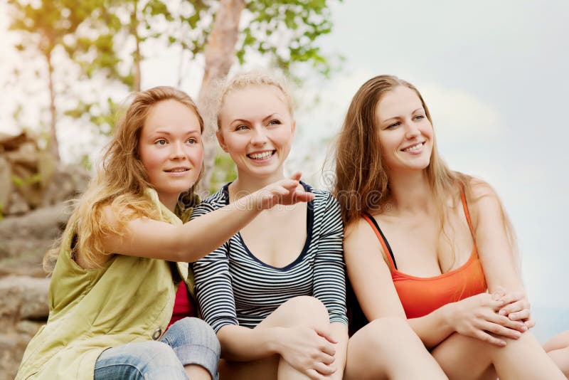 Three Cute Talking Friends Outdoors Stock Image - Image of person ...