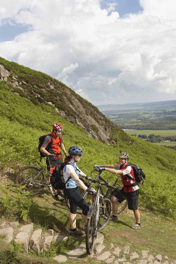 Three Cyclists in Countryside Stock Photo - Image of break, countryside ...