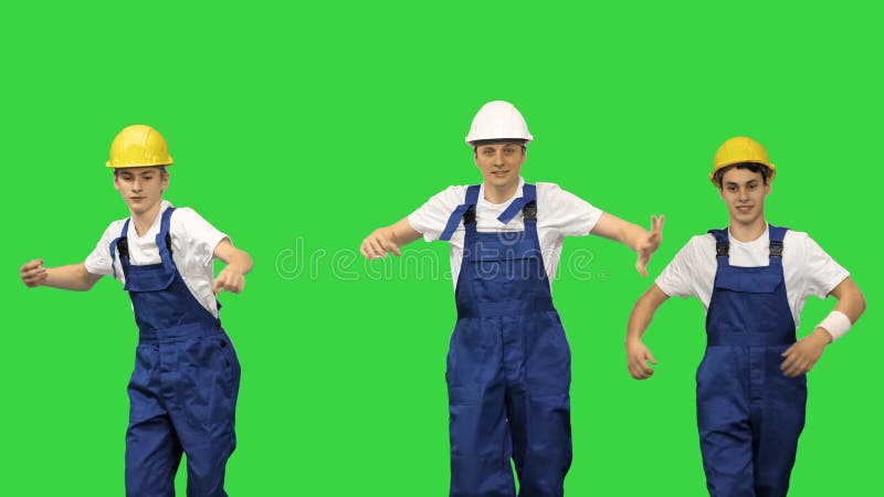 Three Dancing Construction Workers in Hard Hats on a Green Screen ...