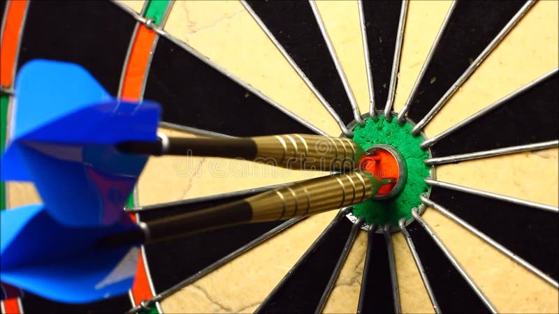 Darts Thrown at a Dartboard and Hitting the Bullseye Stock Video ... Darts Thrown at a Dartboard and Hitting the Bullseye Stock Video ...