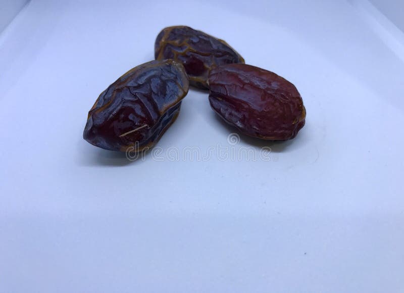 Three Dates with Mint Leaves Isolated on White Background Stock Image ...