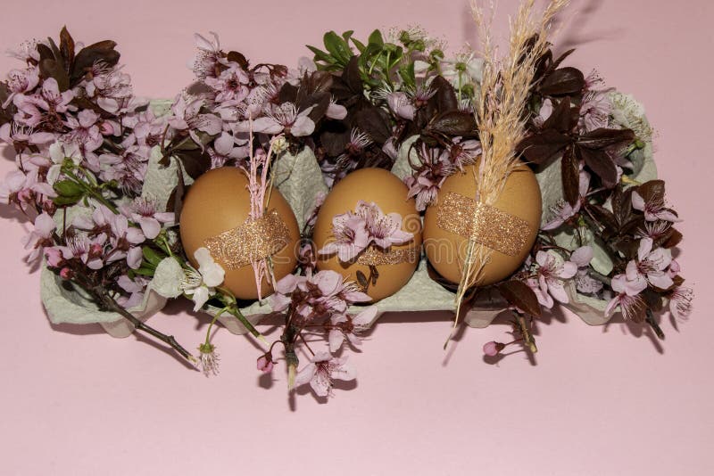 Three Decorated Eggs in an Egg Box with Lots of Flowers, Creative ...