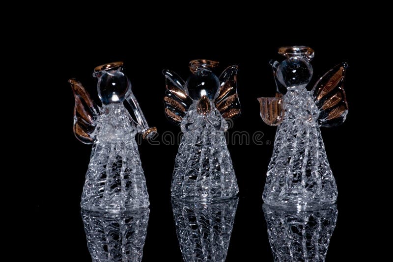 Three Decorative Glass Angels on Stock Photo - Image of trumpet, palm ...