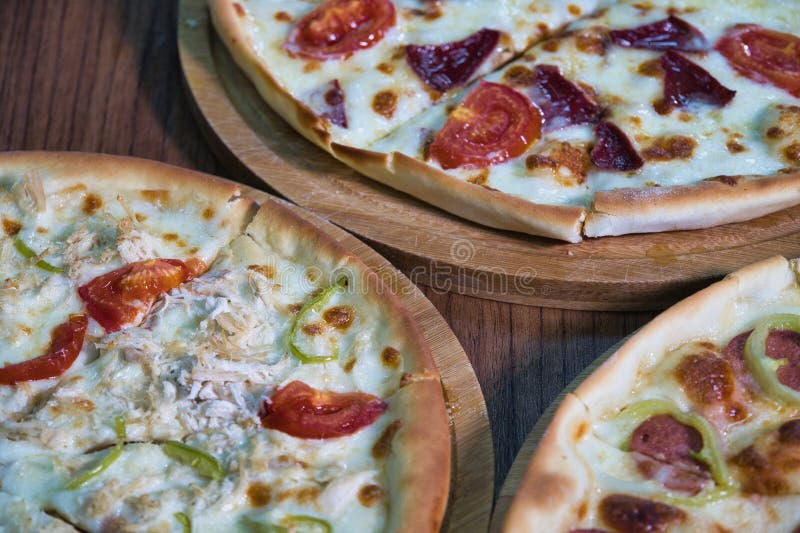 Three Delicious Pizzas with Different Toppings Stock Image - Image of ...