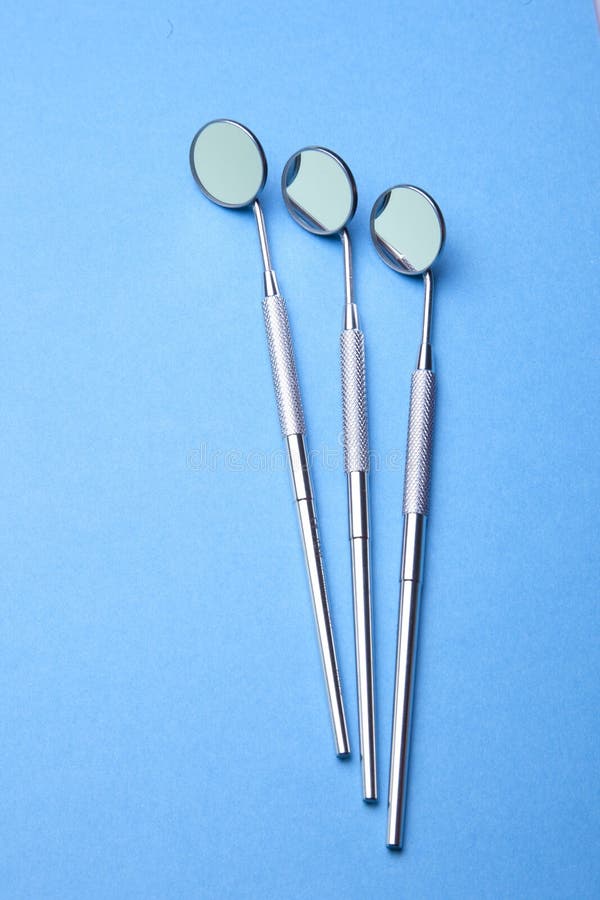 Three Dental Instruments - Angled Mirror Stock Photo - Image of blue ...