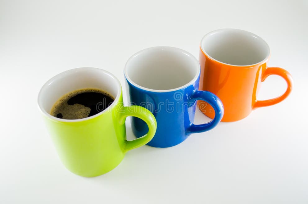 Three Diagonal Mugs with Coffee Mug in the Center Stock Photo - Image ...