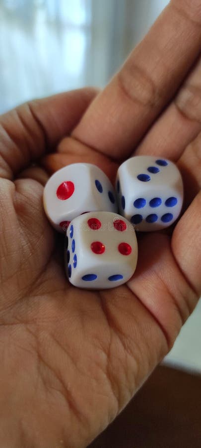 Three Dice (Latin: Datum) in Hand. Dice are Cube-shaped Game Tools ...