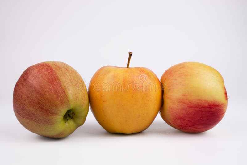 Three Different Apples Lie Close To Each Other Stock Photo - Image of ...