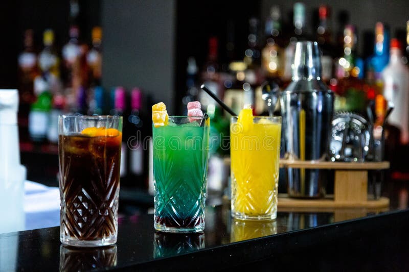 Three Different Cocktails. Coke Cocktail, Blue Cocktail and Yellow ...
