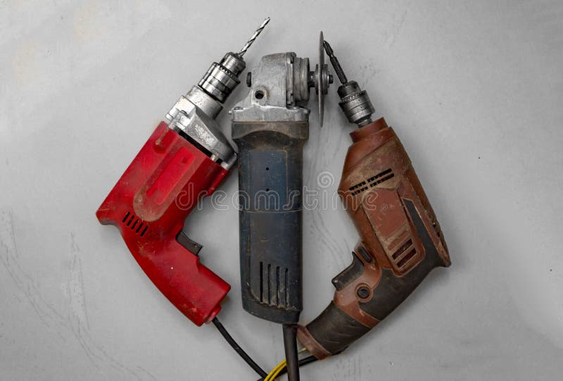 Three Different Colored Drilling and Cutter Machines Stock Image ...