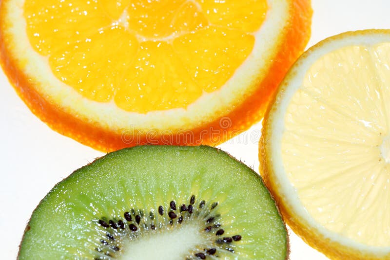 Three Fruits: Orange, Lemon, Kiwi Stock Photo - Image of half, lemon ...