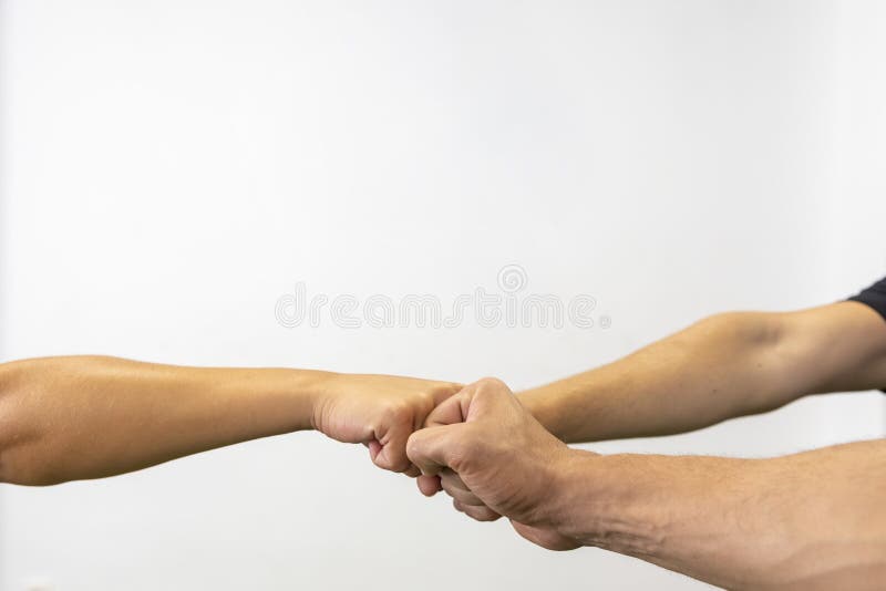 Three Different Hands Clashing Fists Stock Photo - Image of handsome ...