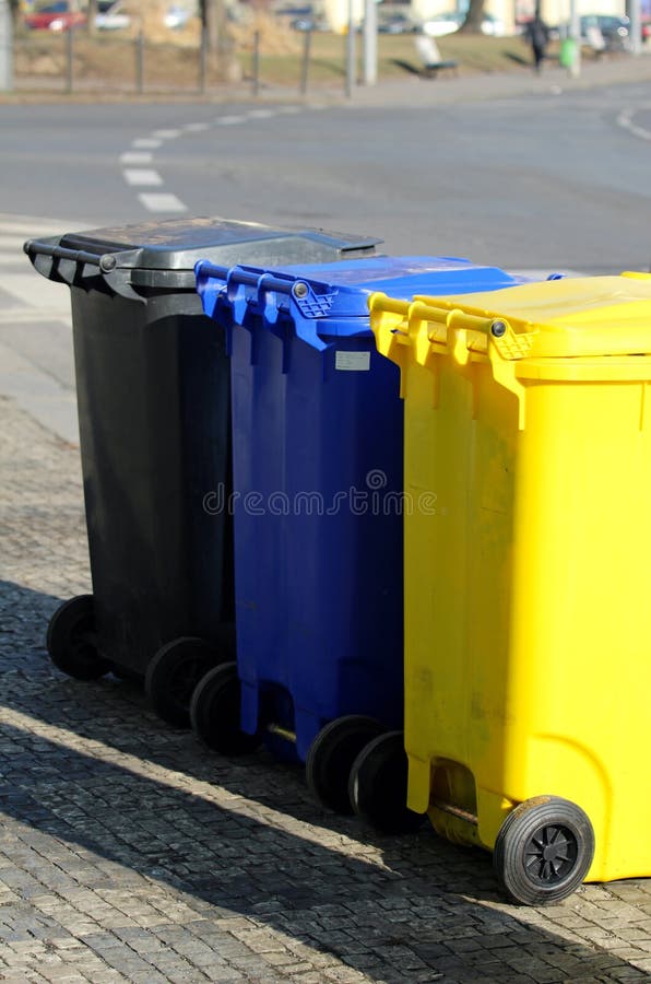 Three Different Multicolored Dustbins on the Street Stock Photo - Image ...