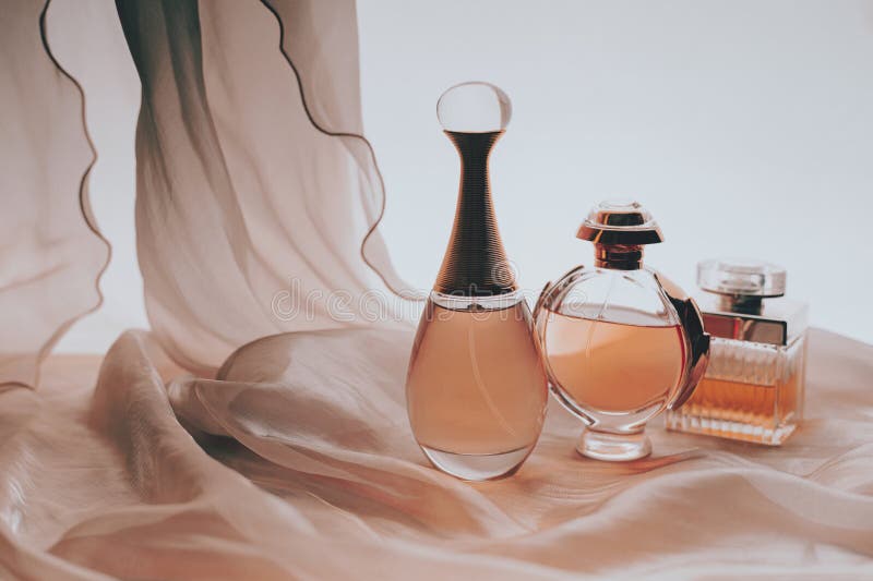 Three different perfumes stock photo. Image of silk - 351417554
