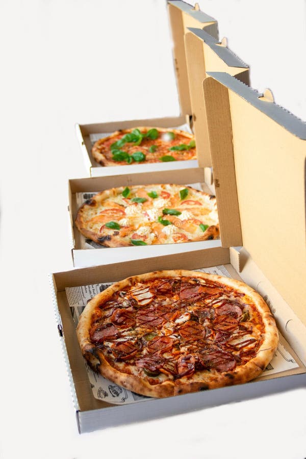 Three Different Pizzas on a White Backgrounds Stock Photo - Image of ...
