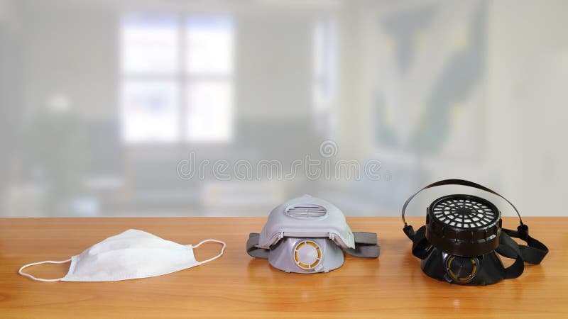 Three Different Respiratory Protective Devices are on the Table Stock ...