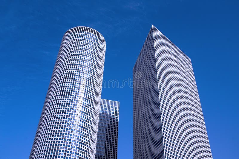 Three Different Shaped Skyscrapers Against a Blue Sky Stock Image ...