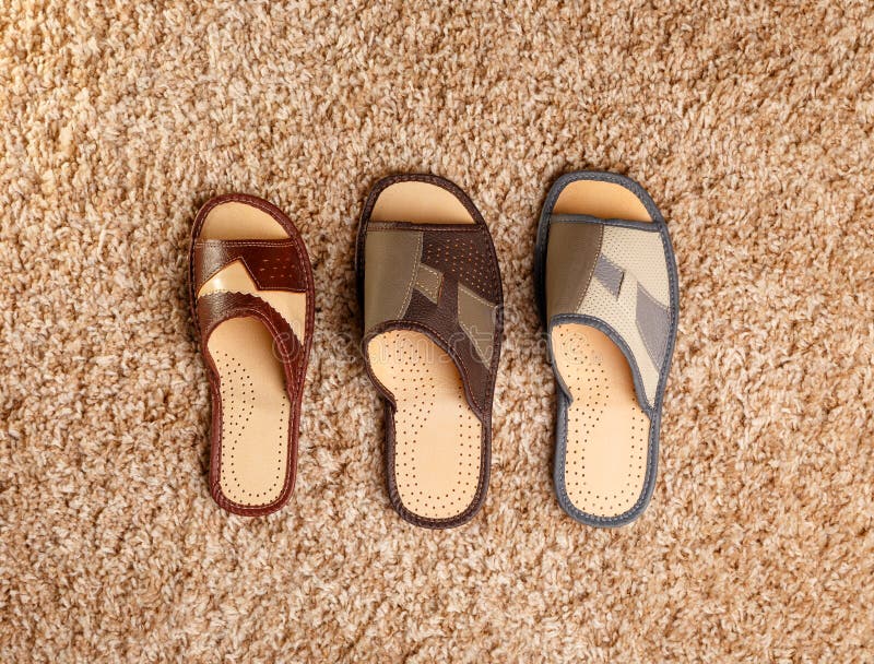 Three Different Sized Slippers Stock Photo - Image of bedroom, object ...