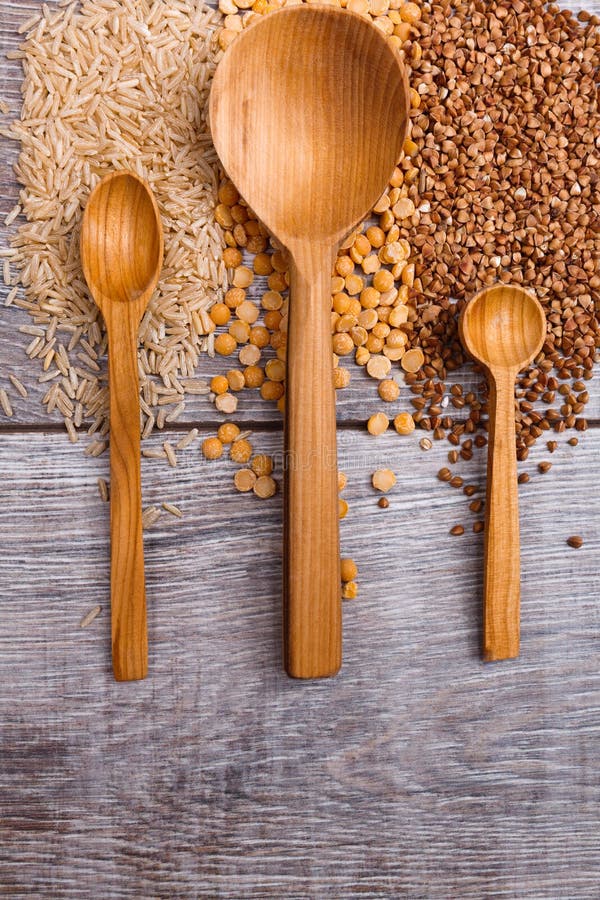 Three Different Wooden Spoons are Lying on the Table Stock Image ...
