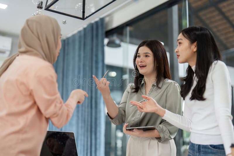 Diverse Women Collaborating in a Modern Office Meeting, Discussing ...