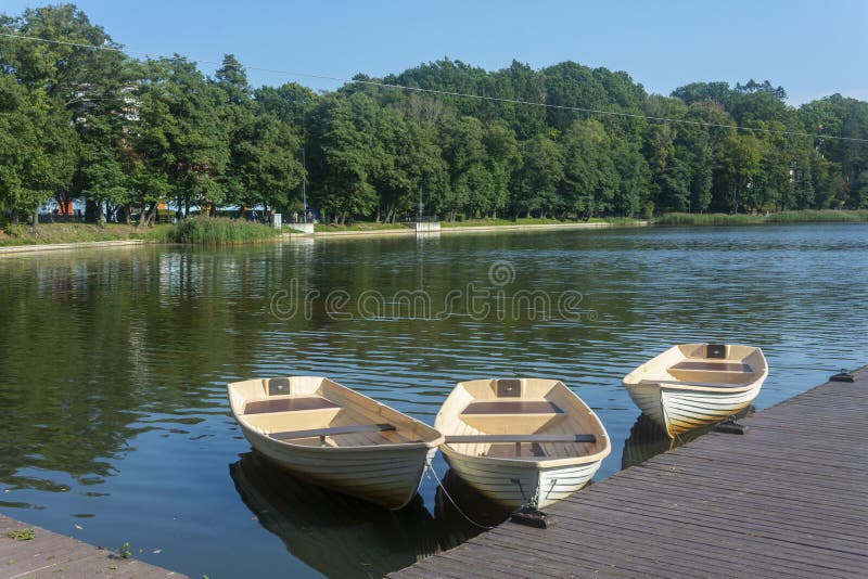 Three Docks Near the Pier for Walks on the Lake, Boat Rental. Selective ...