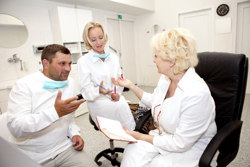 Three Doctors Talking Picture. Image: 16411145