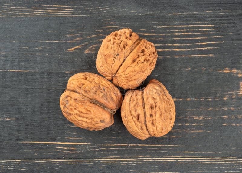 Three dry walnuts stock photo. Image of broken, crop - 134852012