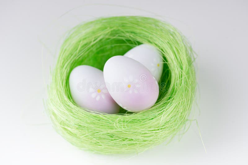 Three Easter Eggs in Circle Green Nest Stock Photo - Image of ...