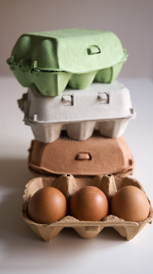 Three Egg Cartons Stacked on the Table Stock Photo - Image of white ...