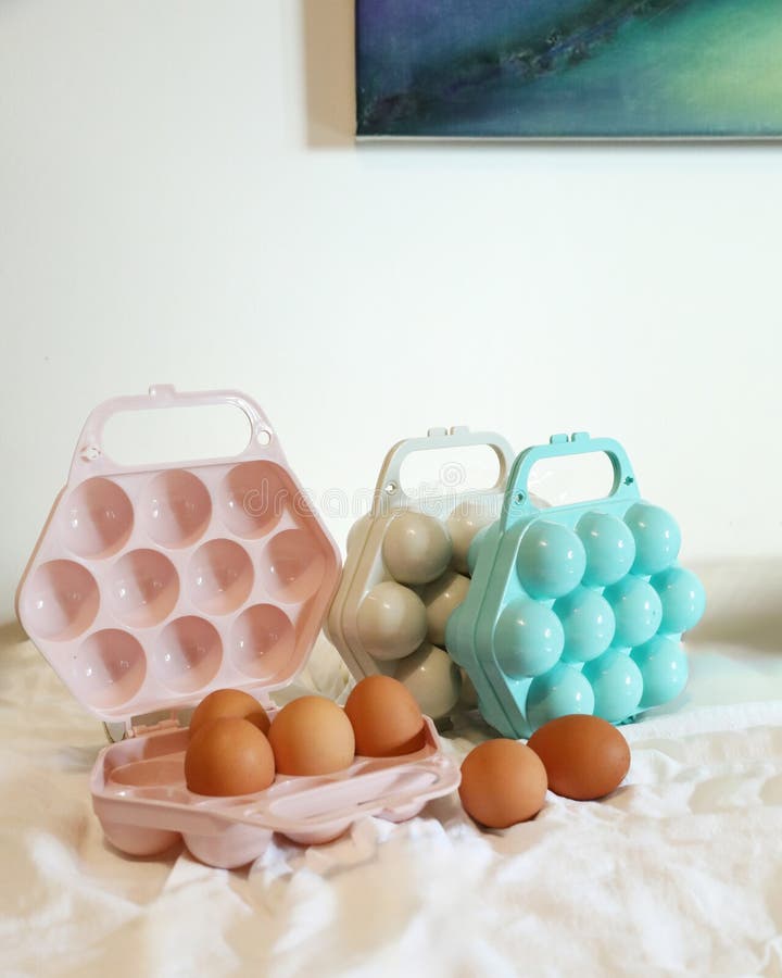The Three Egg Containers on the Table Stock Image - Image of multicolor ...