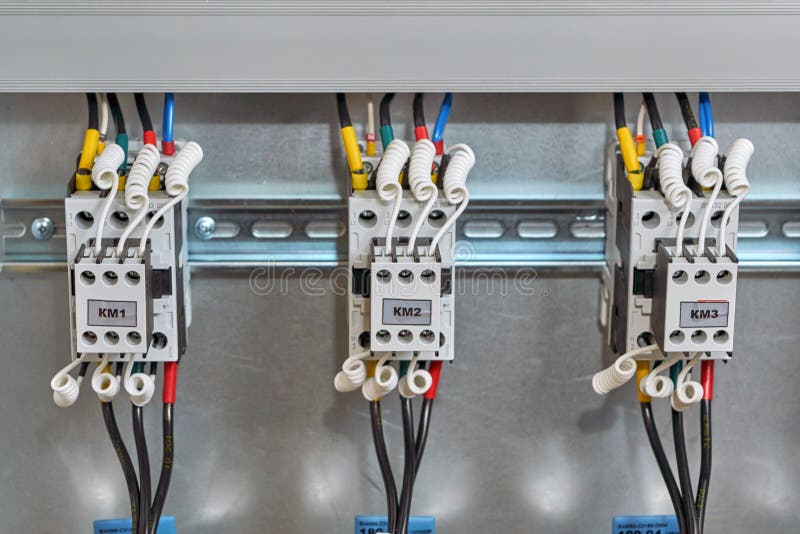 Three Contactors are Arranged in a Row in the Electrical Cabinet Stock ...
