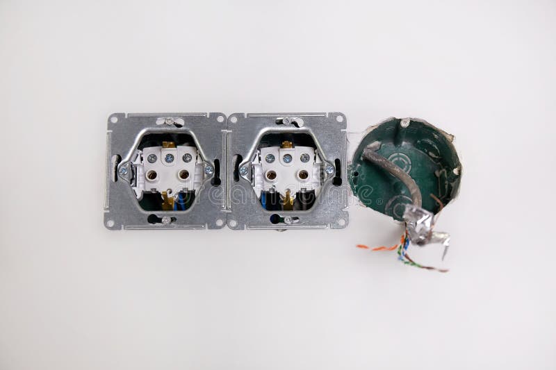 Three Electrical Boxes for Conduits are Built into the Wall. Work on ...