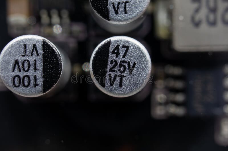 Three Electronic Component Capacitor (close Up). Stock Photo - Image of ...