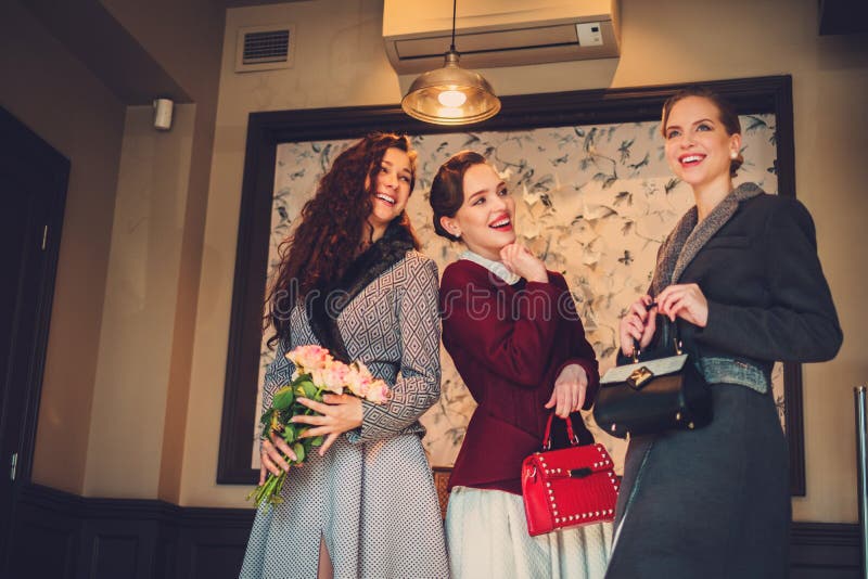 Three Elegant Young Ladies Ready for a Party Stock Image - Image of ...