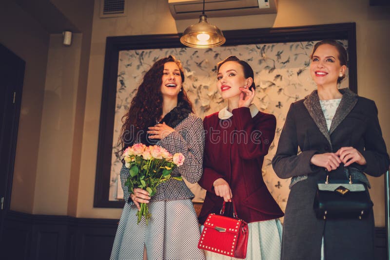 Three Elegant Young Ladies Ready for a Party Stock Image - Image of ...