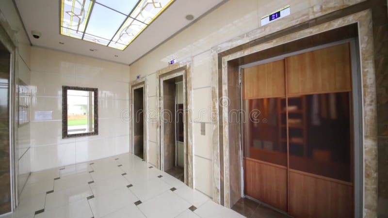 Three Elevator Doors in Corridor with Stained Stock Footage - Video of ...