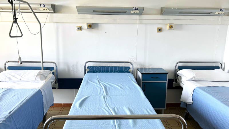 Three Empty Beds in a Hospital Room Stock Photo - Image of medicine ...