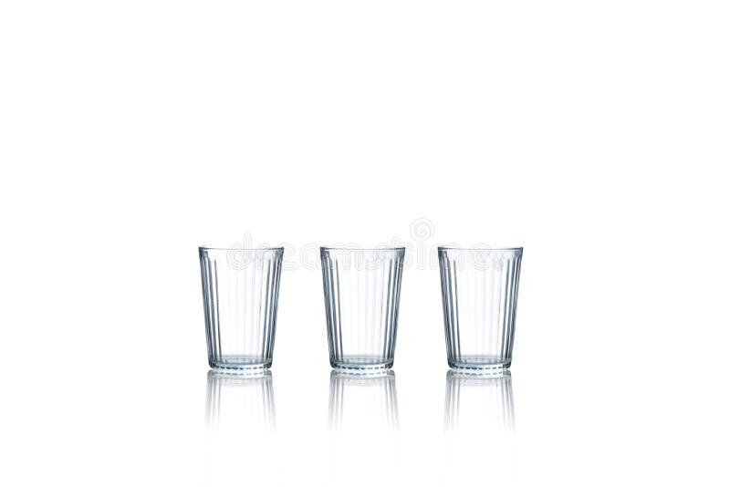 Three Empty Cups Made of Glass Isolated on a White Background Stock ...