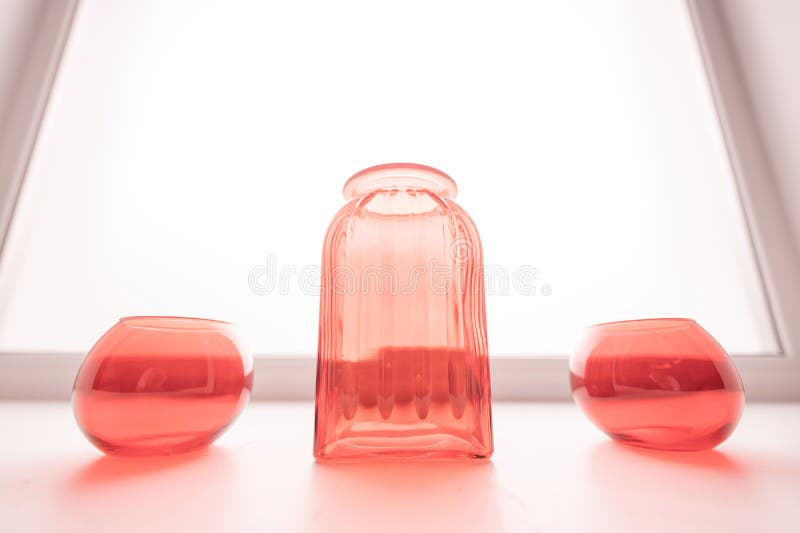 Three Empty Glass Red Vases on the Windowsill. Stock Photo - Image of ...