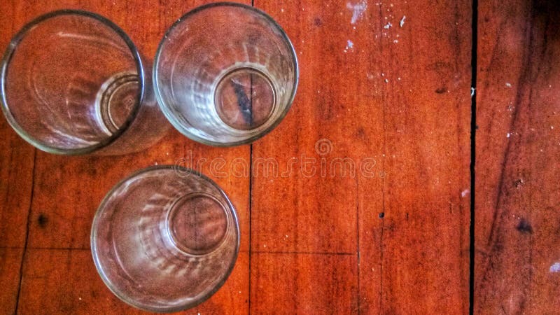 Three Empty Glasses stock photo. Image of three, brown - 130921616