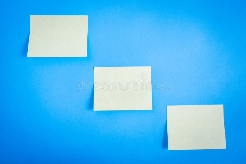 Three Empty Sticky Notes, on a Blue Background Stock Photo - Image of ...