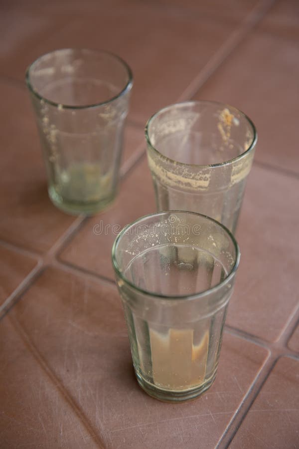 Three Empty Tea Glasses on Plastic Table. Stock Photo - Image of shiny ...