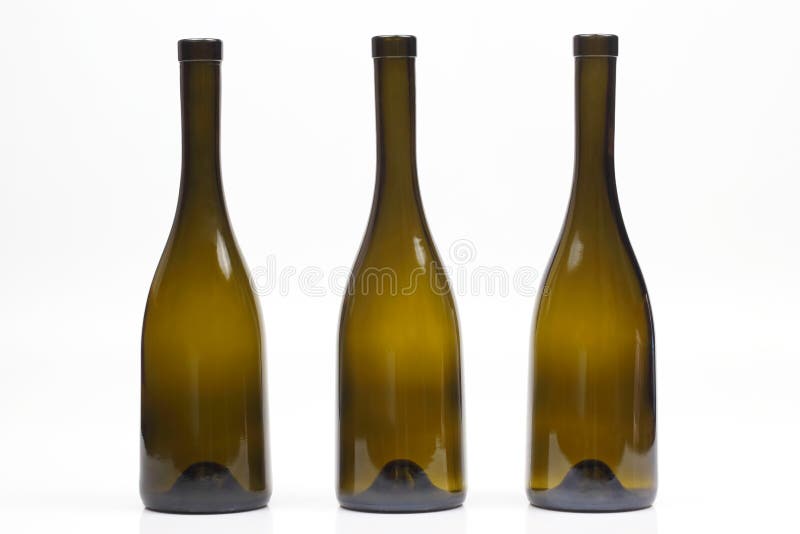 Three Wine Bottles And Two Empty Wine Glasses Close Up Stock Image ...