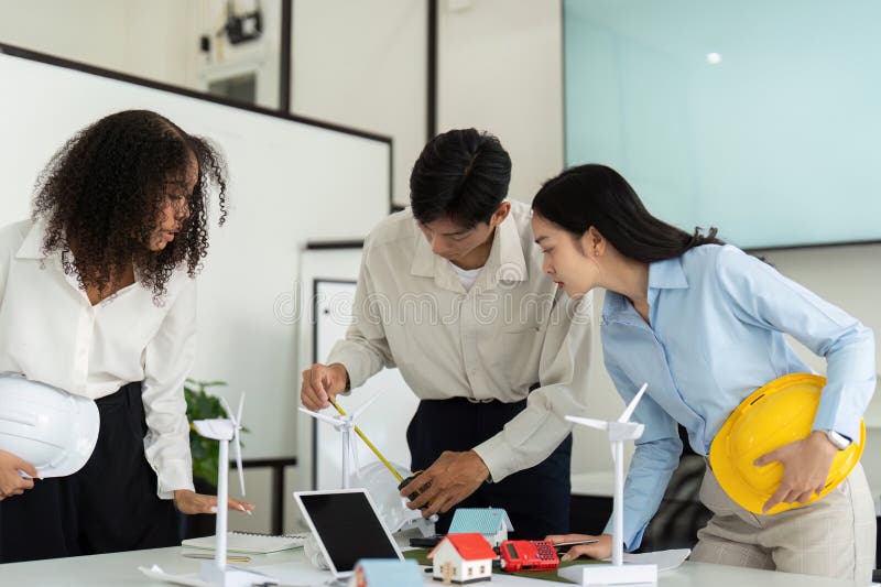 Sustainable Design and Team Collaboration. Professionals Working on Eco ...