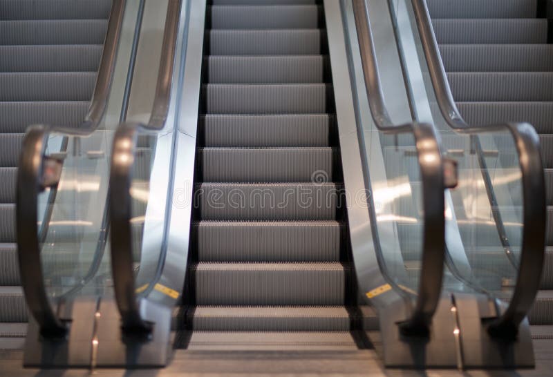 Three escalators stock image. Image of horizontal, handrail - 13827817