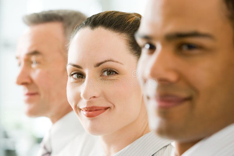 Team of Three People Working on the Project and Sitting in a Circle ...