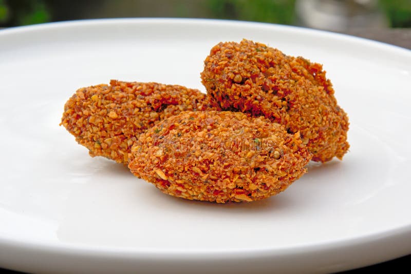 Three Falafel Balls, Humus and Salad on a Plate, Selective Focus Stock ...